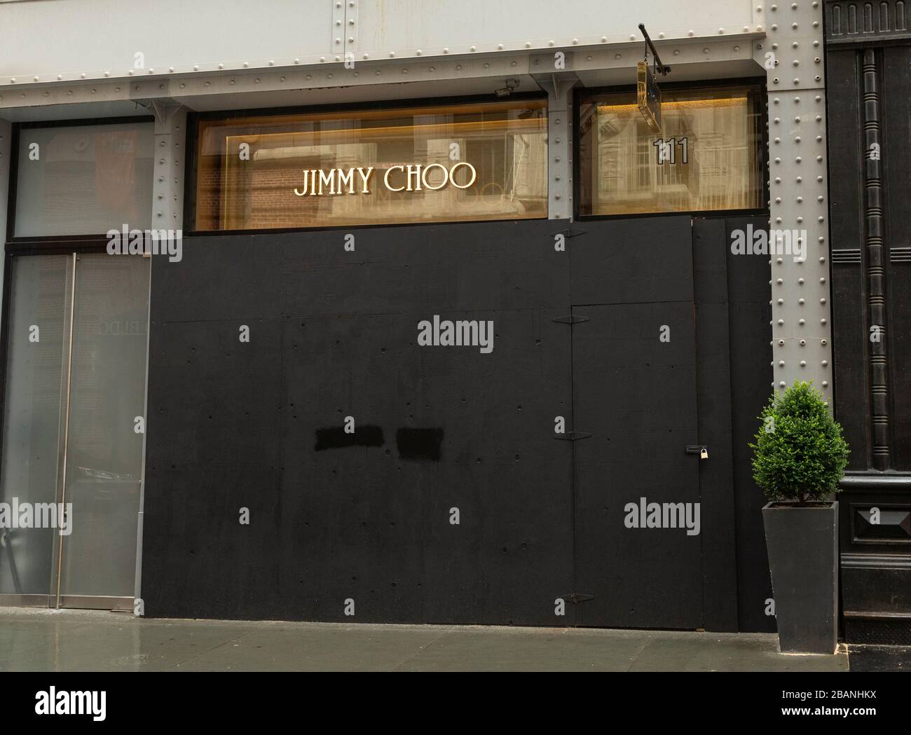 New York, NY - March 28, 2020: Some high end stores like Jimmy Choo on ...