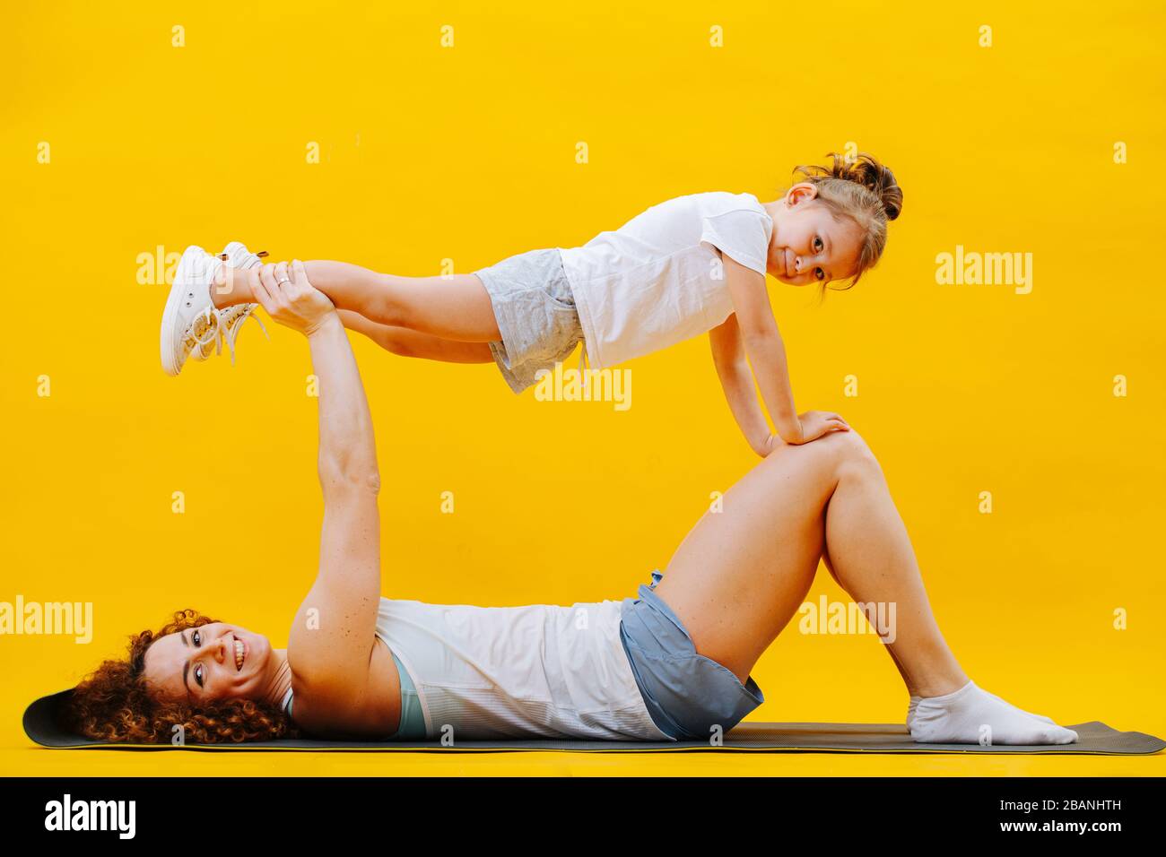 Mom and daughter have fun in training Stock Photo - Alamy
