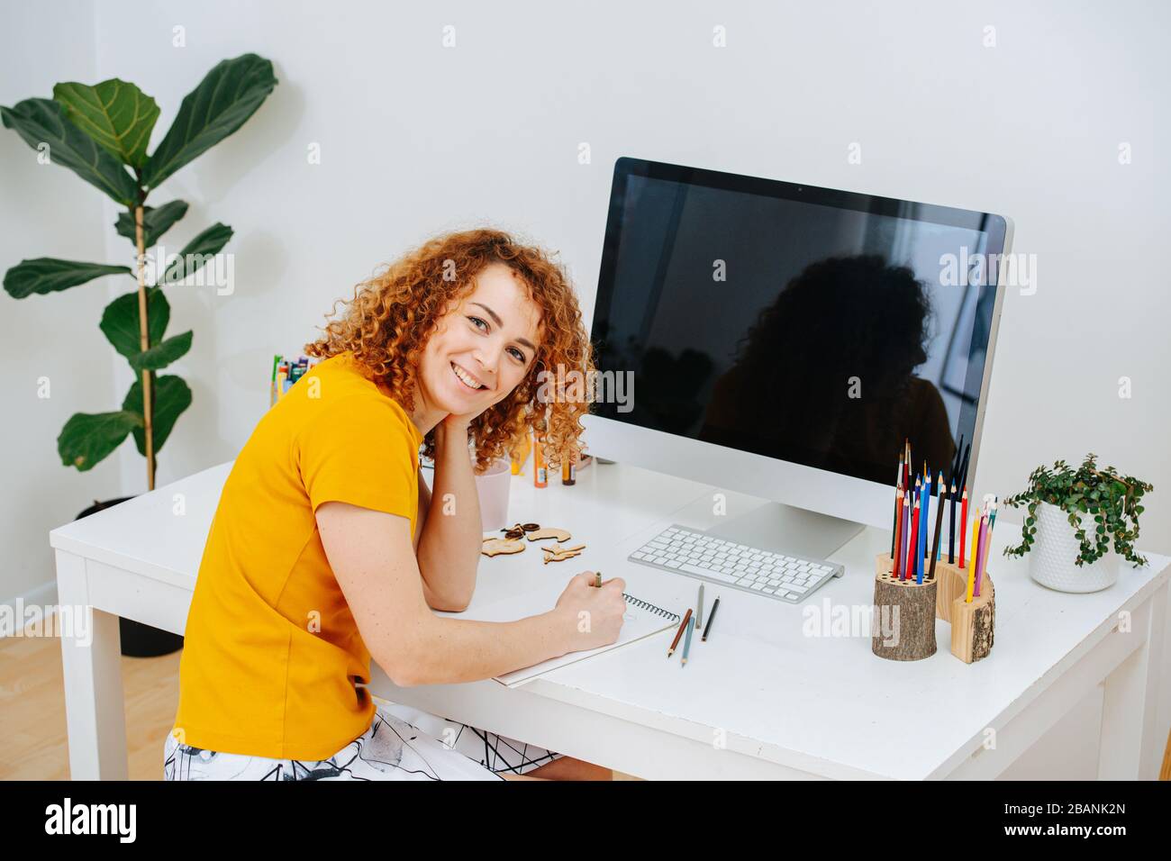 Woman working remotely desk in hi-res stock photography and images - Alamy