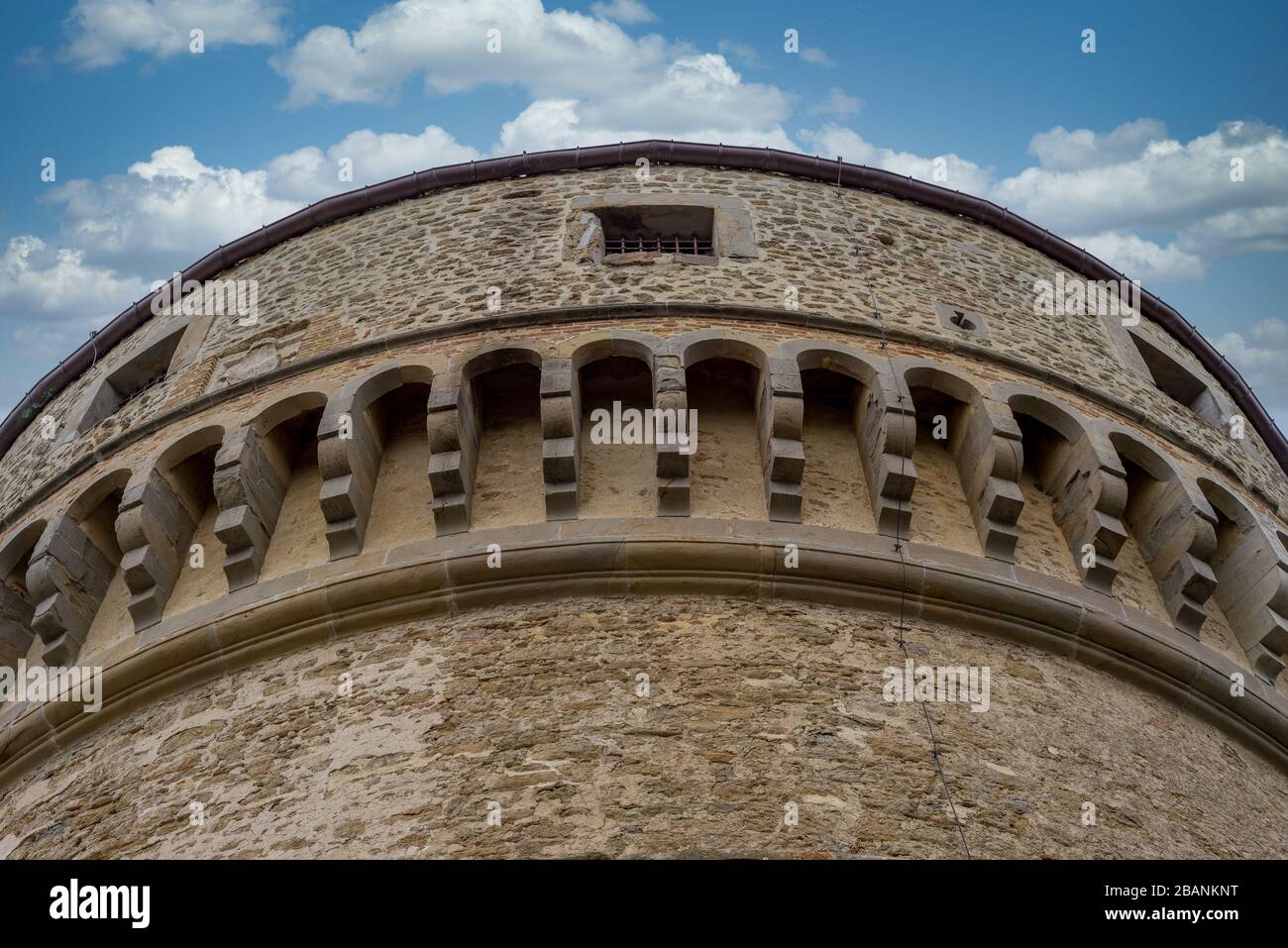 Medieval machicolation of a cannon tower supporting corbels of a ...