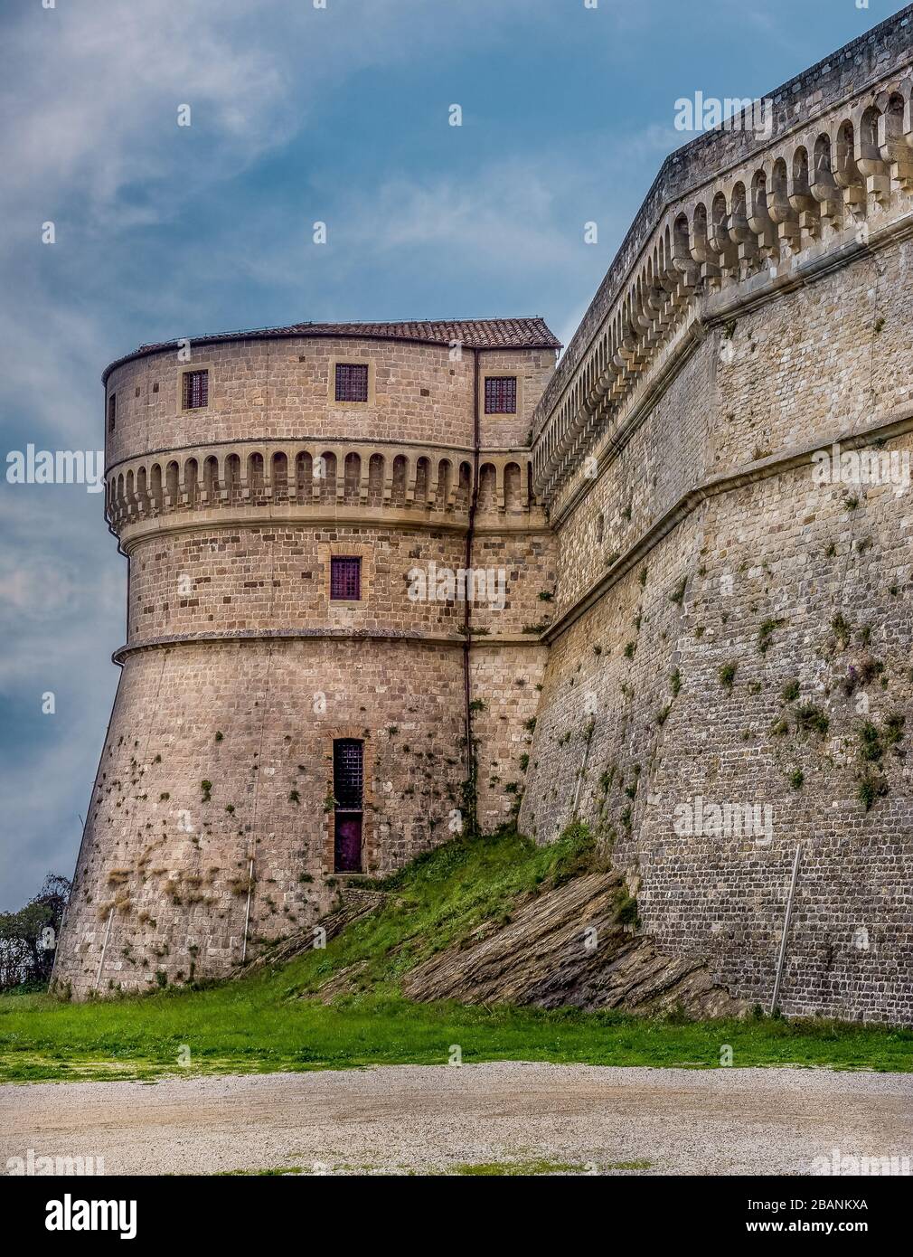 Renaissance cannon tower with embrasures and machicolation at San Leo ...