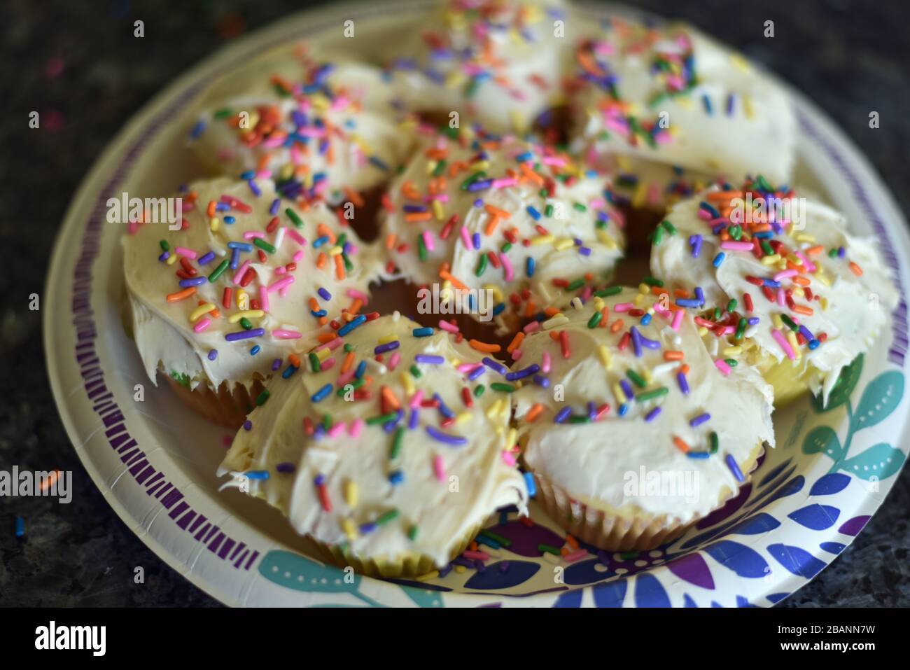 Individual vanilla cupcakes buttercream frosting hi-res stock ...
