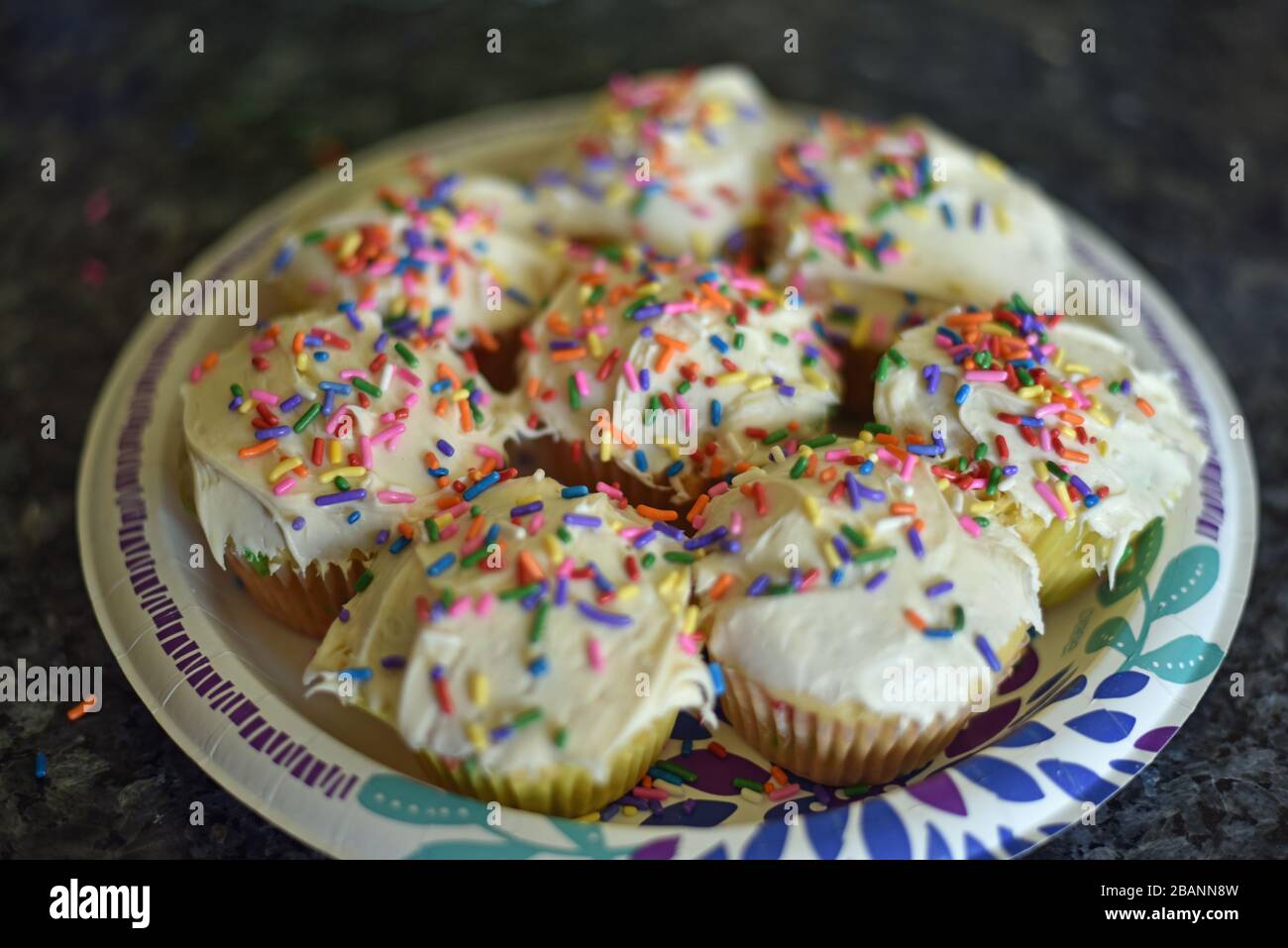 Individual vanilla cupcakes buttercream frosting hi-res stock ...