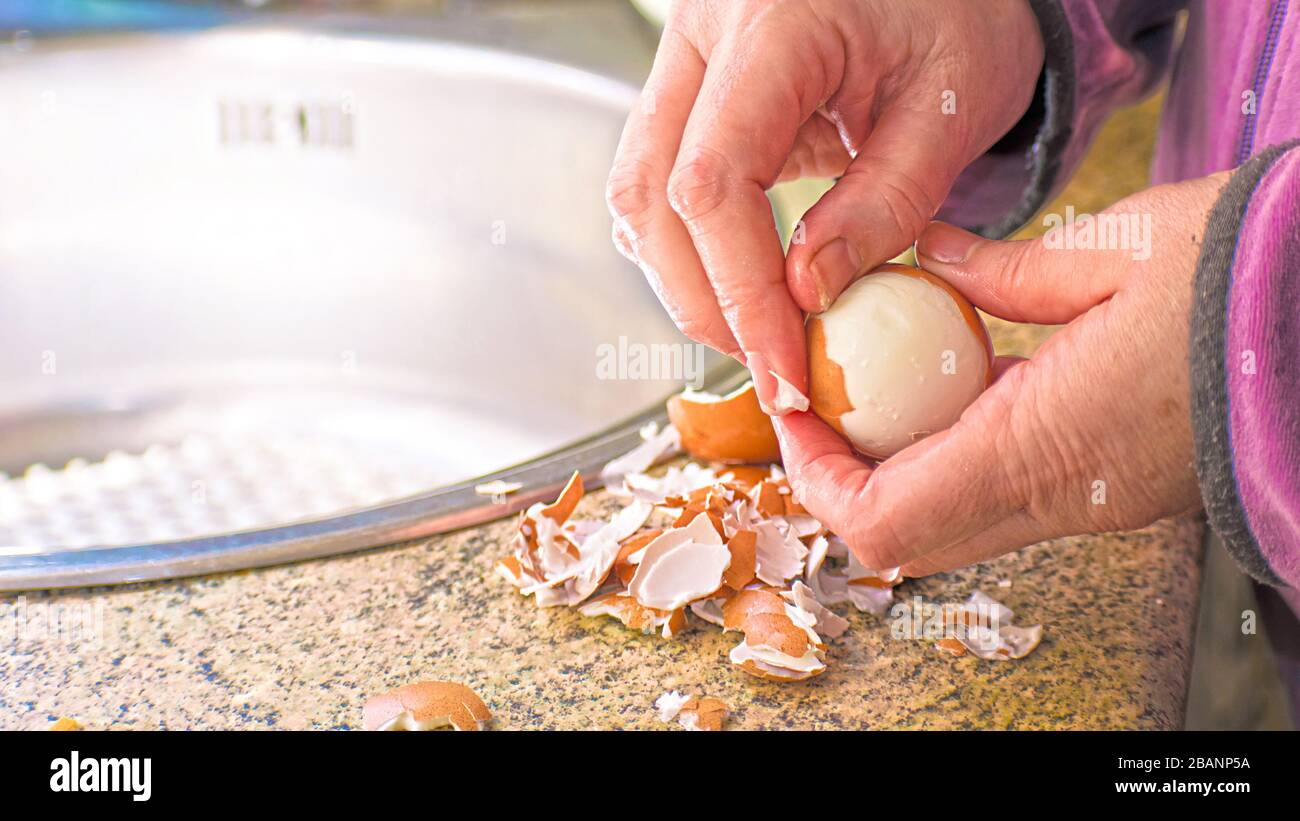 immediately soak hot boiled eggs in cold water make it easily peel ...