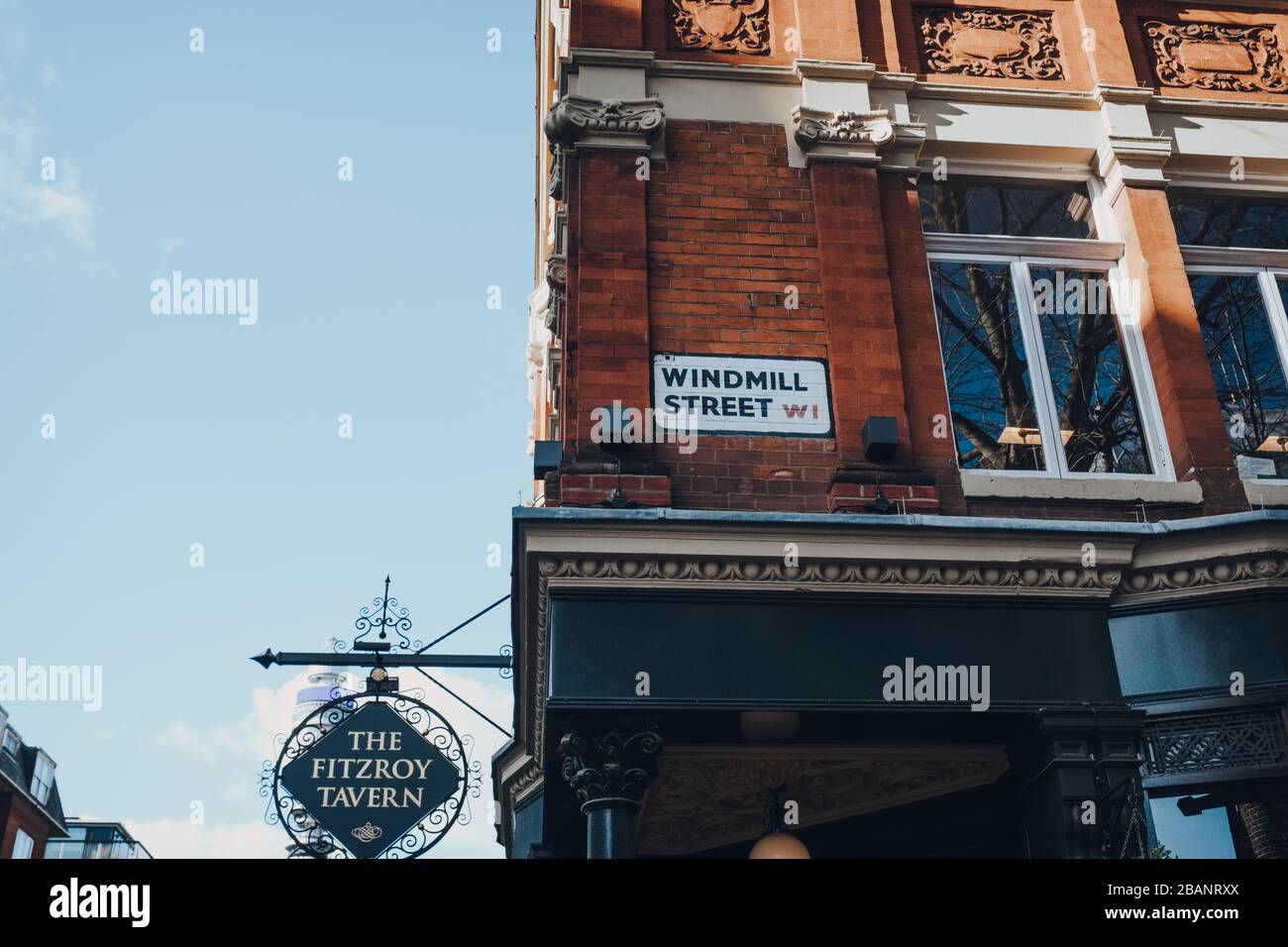 London, UK - March 6, 2020: Street name sign on a building in Windmill ...