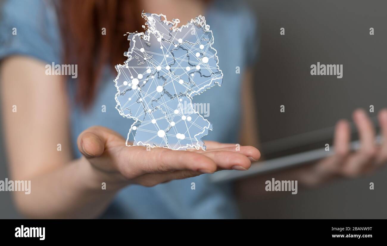 A a virtual germany land map digital in hand 3d Stock Photo - Alamy