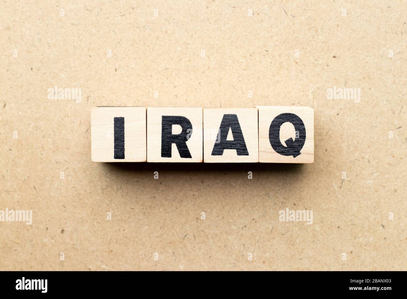 Letter block in word iraq on wood background Stock Photo - Alamy