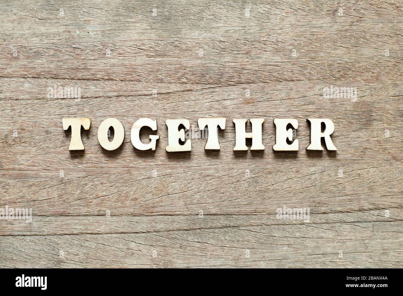 Letter block in word together on wood background Stock Photo - Alamy