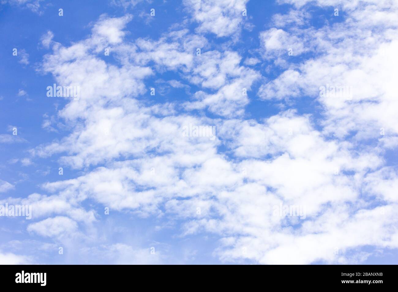 Clear blue color sky with white cloud background Stock Photo - Alamy