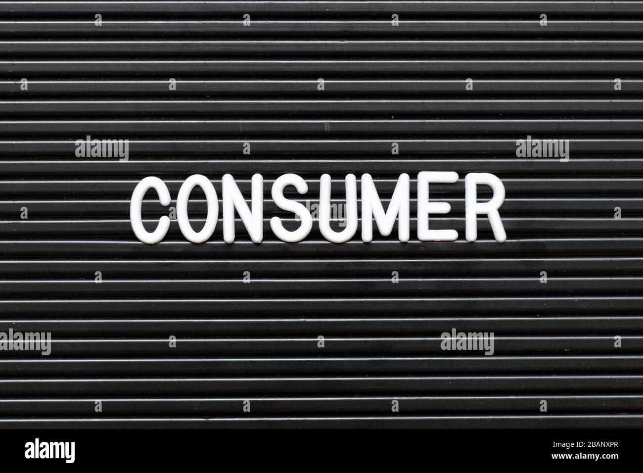 Black color felt board with word consumer background Stock Photo - Alamy