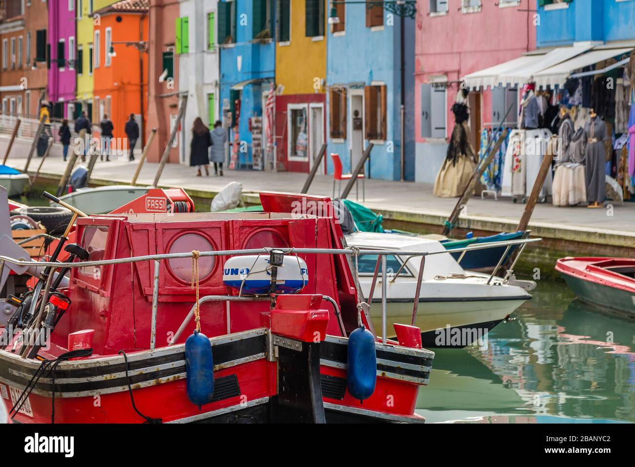 BURANO (VE), ITALY - FEBRUARY 21, 2020: tourists walking along the ...