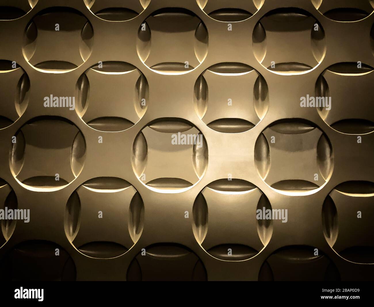 Close up of gold, circular patterned metal sheet Stock Photo - Alamy