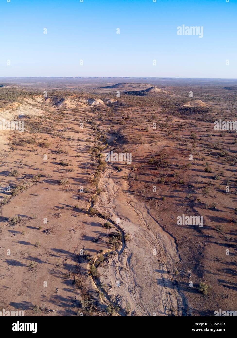 Aerial of dry creek bed in arid landscape near Thargomindah Bulloo ...