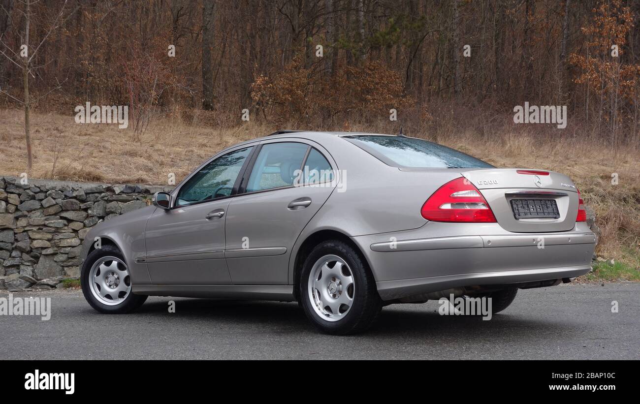 Isolated Mercedes-Benz E class - alias W211, gold metallic colour ...