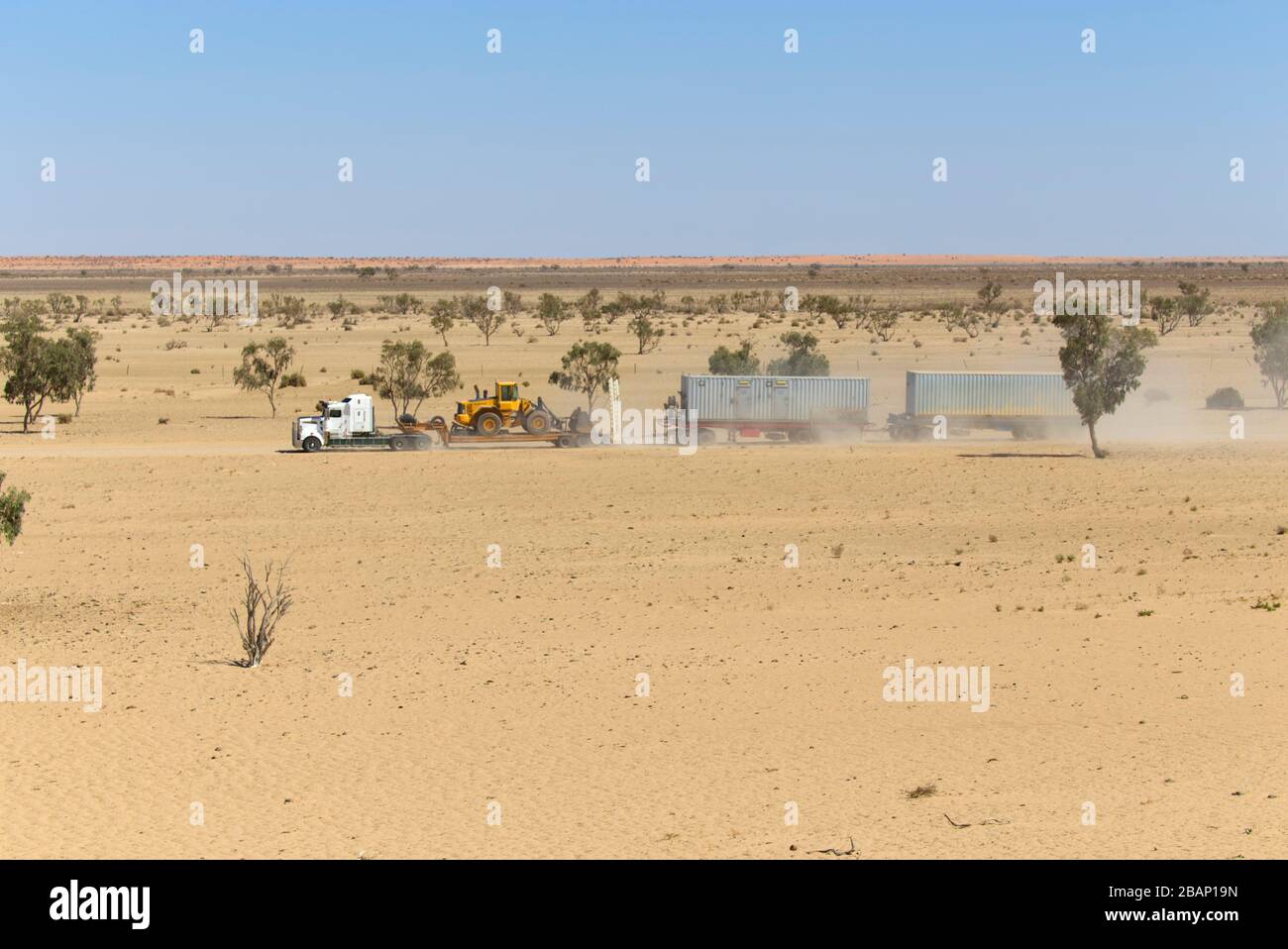 Road train travelling along the dusty unsealed Strzelecki Track in ...