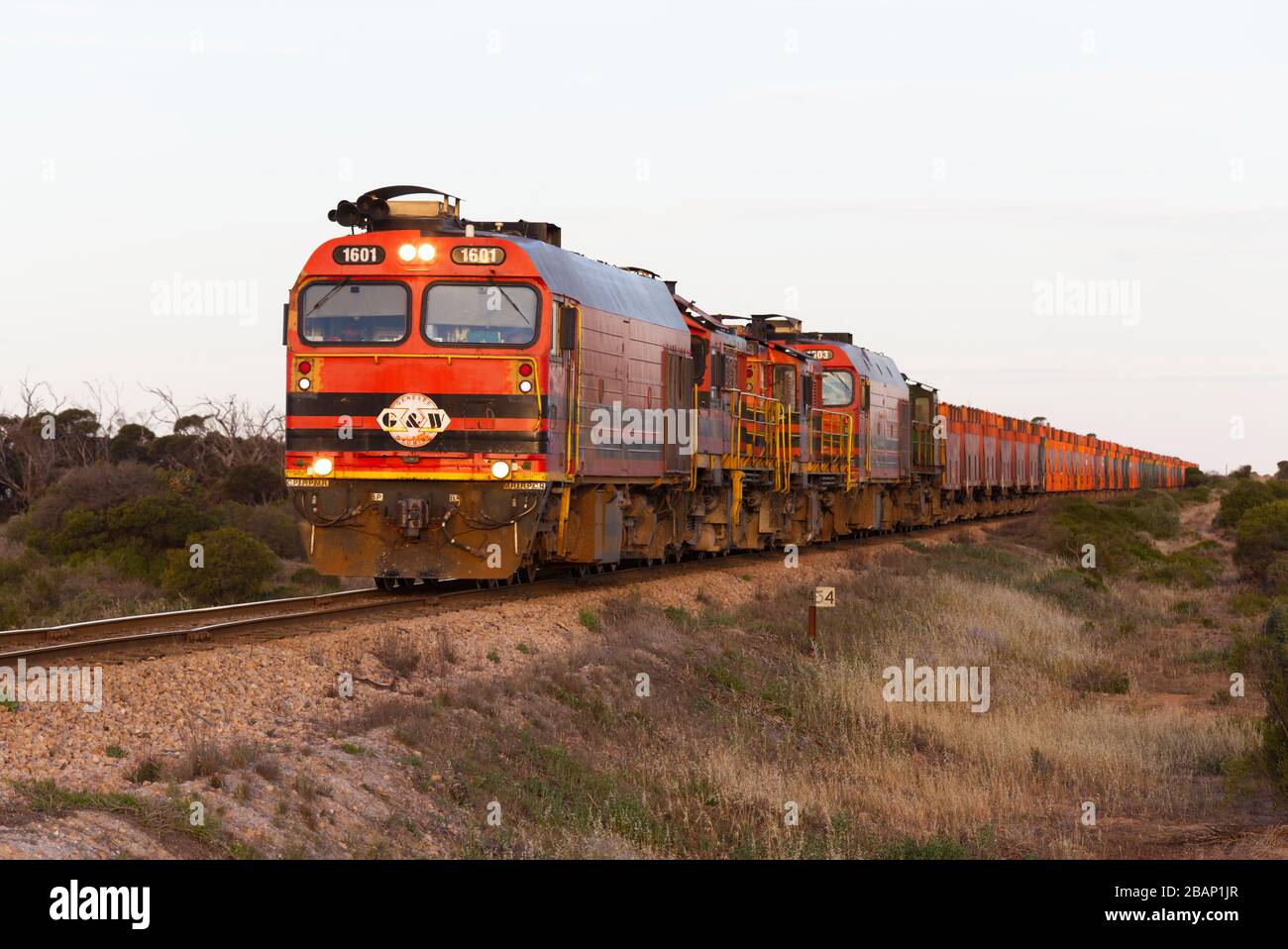 Freight train carrying gypsum running on an isolated line from Kevin to ...