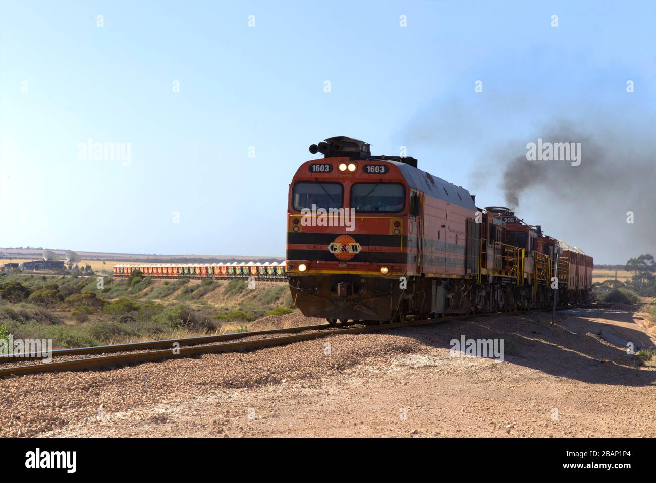 Freight train carrying gypsum running on an isolated line from Kevin to ...