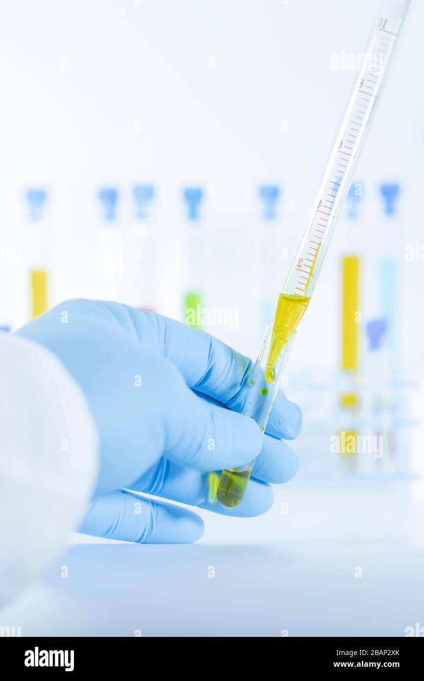 Using a graduated glass pipette and sample tube Stock Photo - Alamy