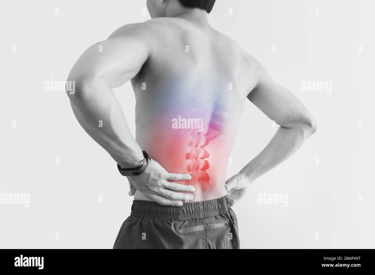 Lower back pain. Shirtless man touching his back with red highlight, on ...