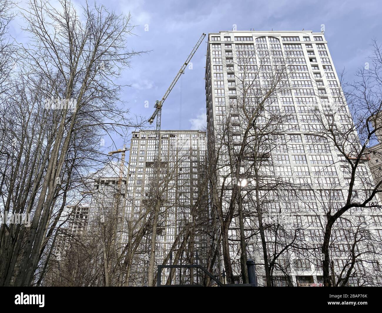 new residential area. high-rise apartment buildings under construction ...