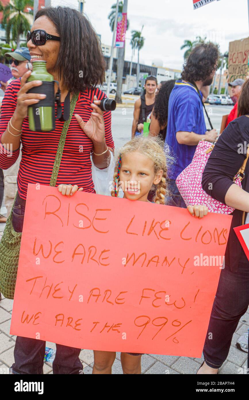 Sign protest poster holding woman kid hi-res stock photography and ...