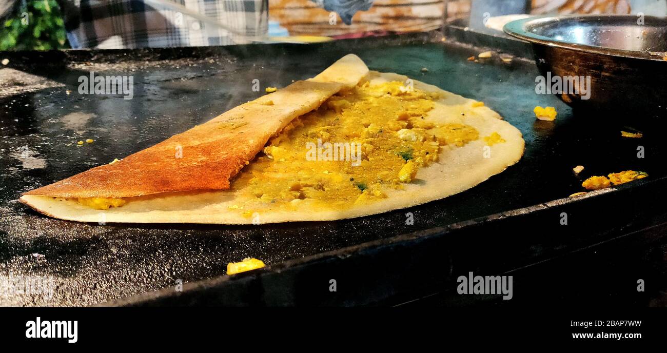 A Dosa is a cooked flat thin layered rice batter, originating from the ...