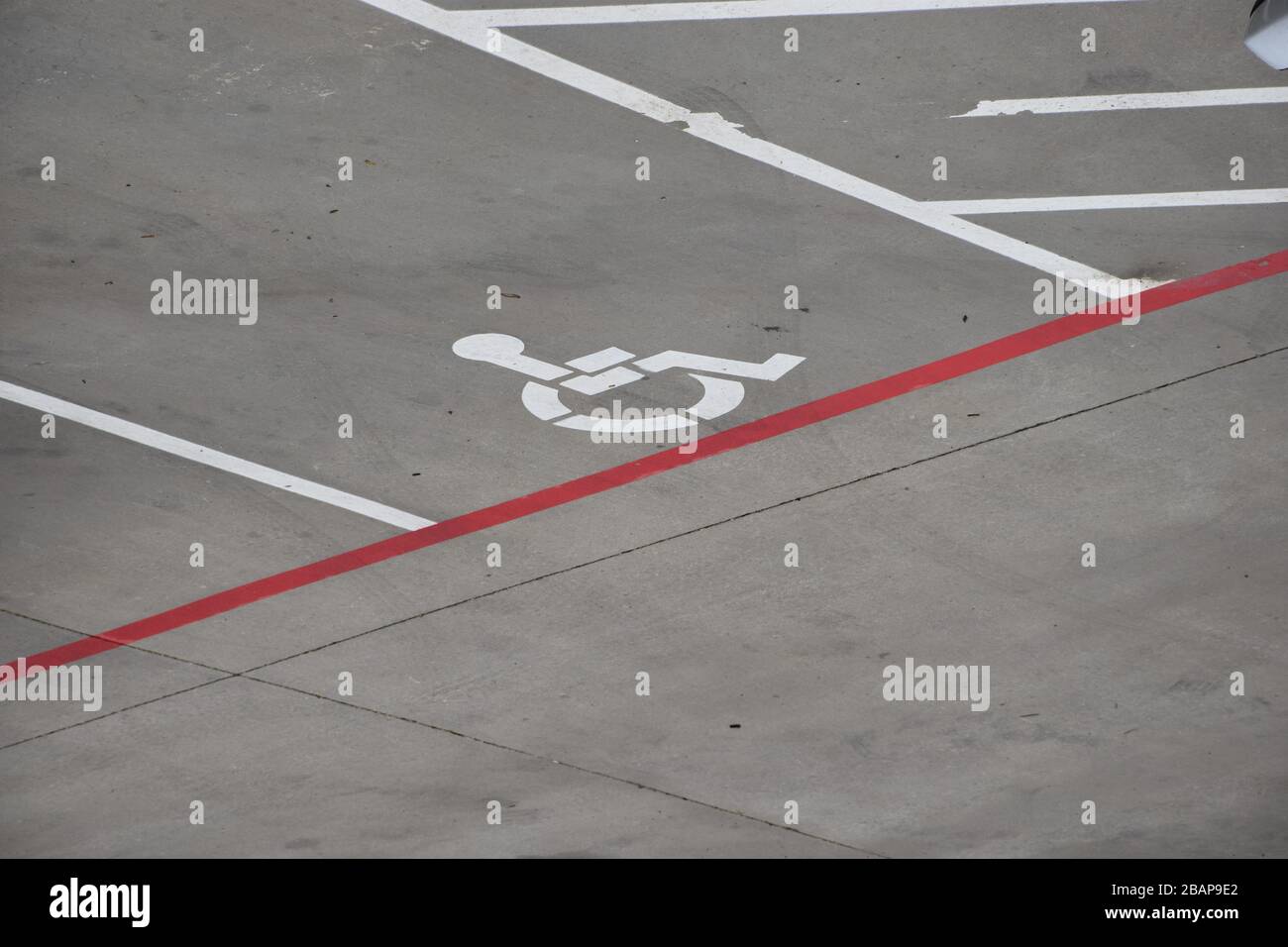 Wheelchair parking symbol on pavement High Resolution Stock Photography ...