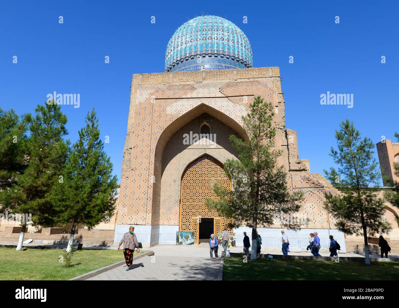 Courtyard view of Bibi-Khanym Mosque lateral building. Persian with ...
