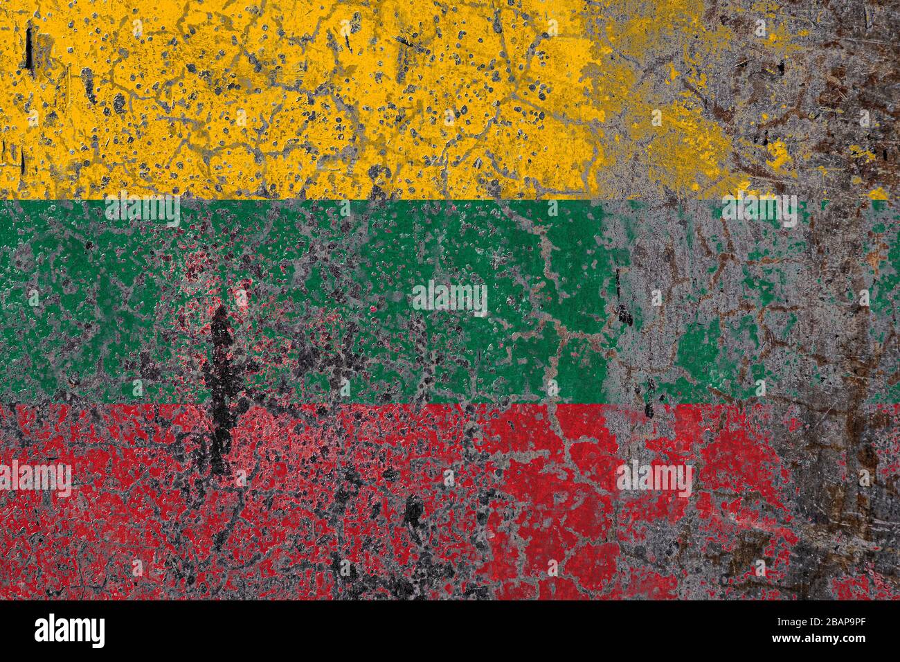 National flag of Lithuania on old peeling wall background.The concept ...