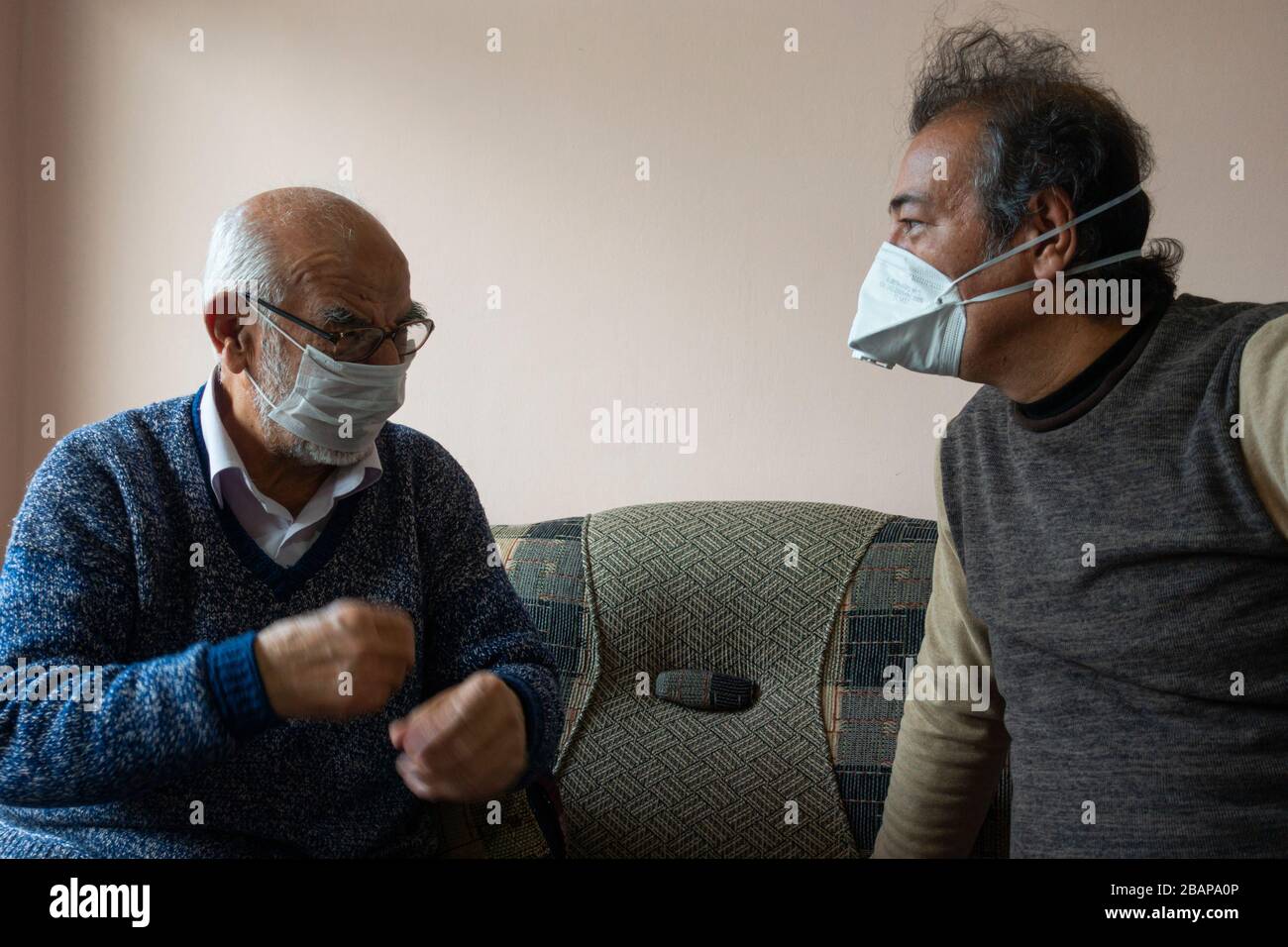 Elderly people wearing masks hi-res stock photography and images - Alamy