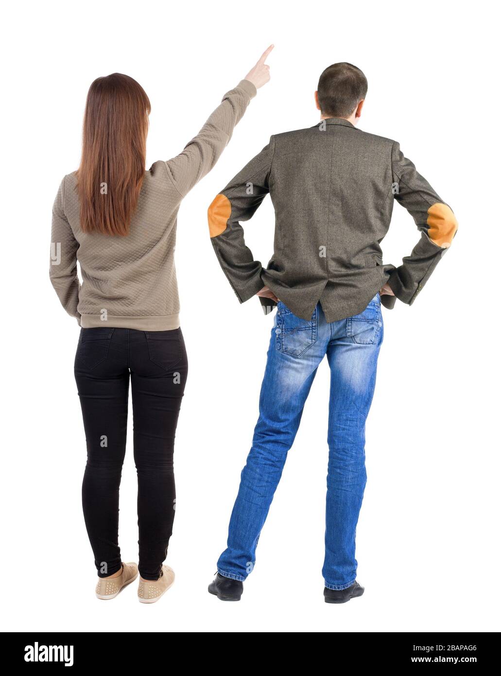 Back view of couple in sweater pointing. Rear view people collection ...