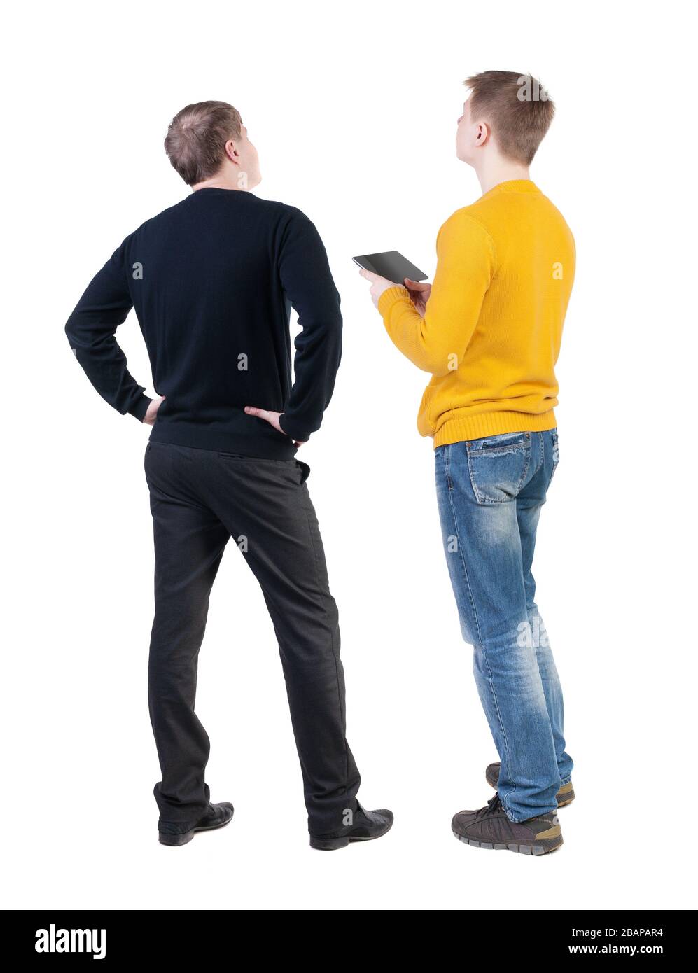 Back view of two man in sweater with mobile phone. Rear view people ...
