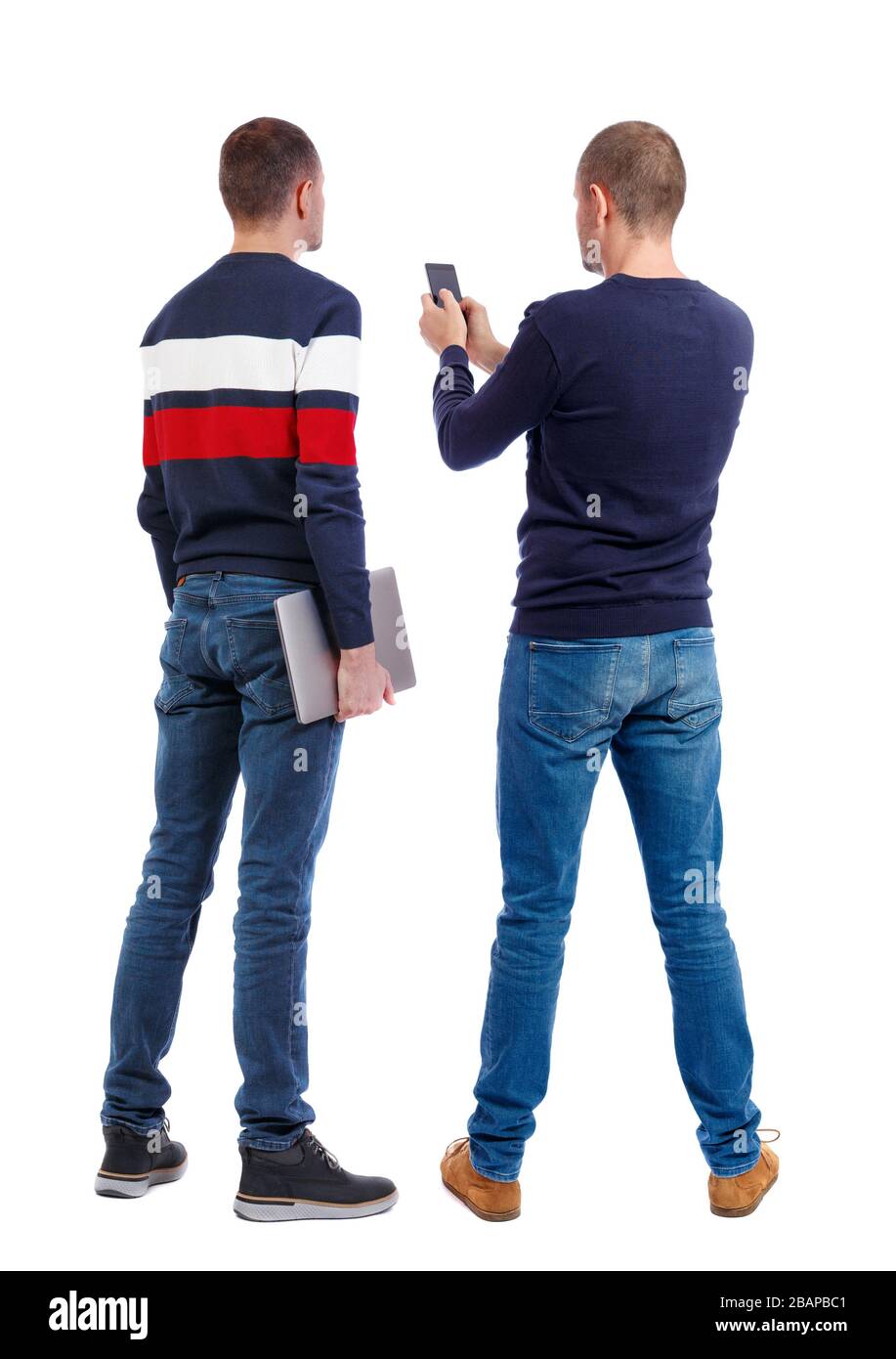 Back view two man in sweater with laptop. Rear view people collection ...