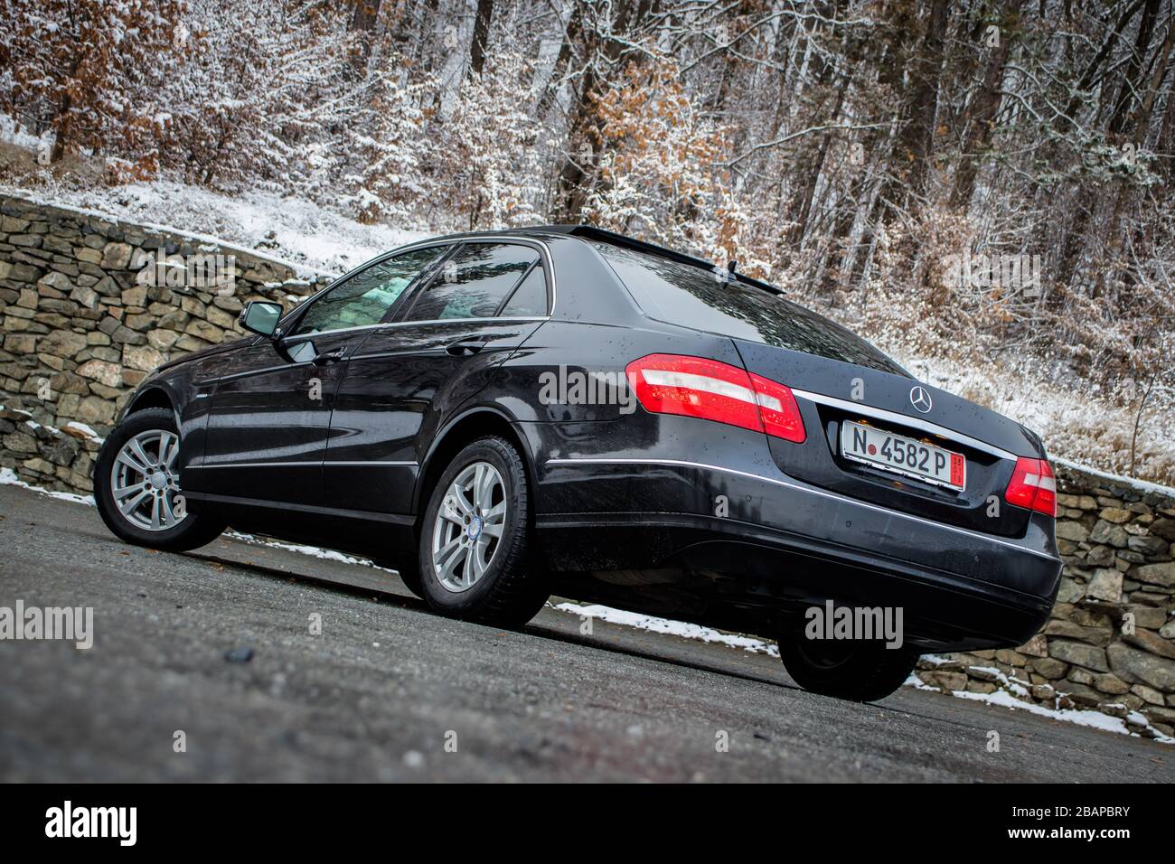 Mercedes-Benz E250 4MATIC photo session in a parking lot-black metallic ...