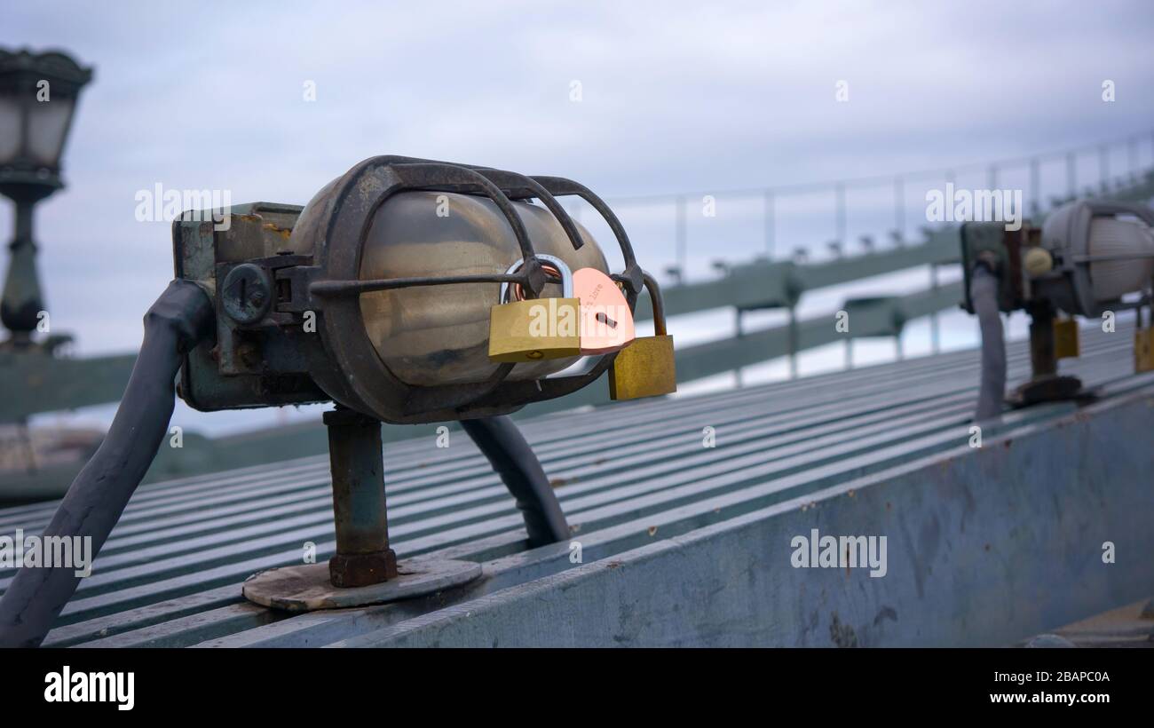 Lamp with padlock mounted on the Budapest Chain Bridge Stock Photo - Alamy