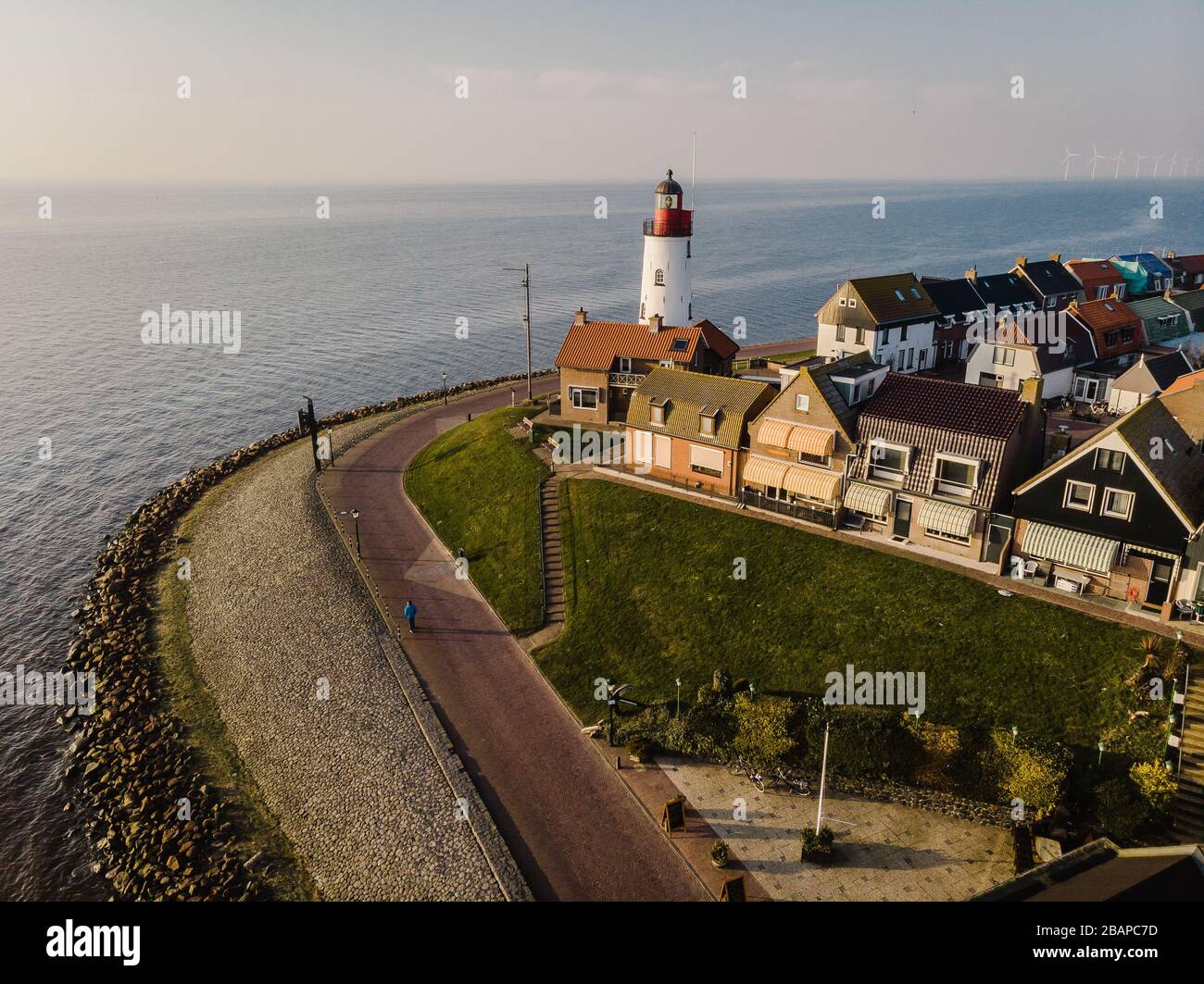 Urk Flevoland Netherlands, harbor with lighthouse on a bright summer in ...