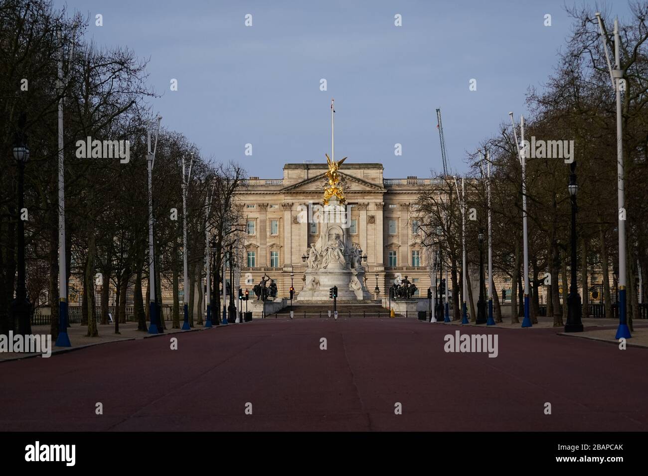 The morning sun hits Buckingham Palace, London as the clocks move ...