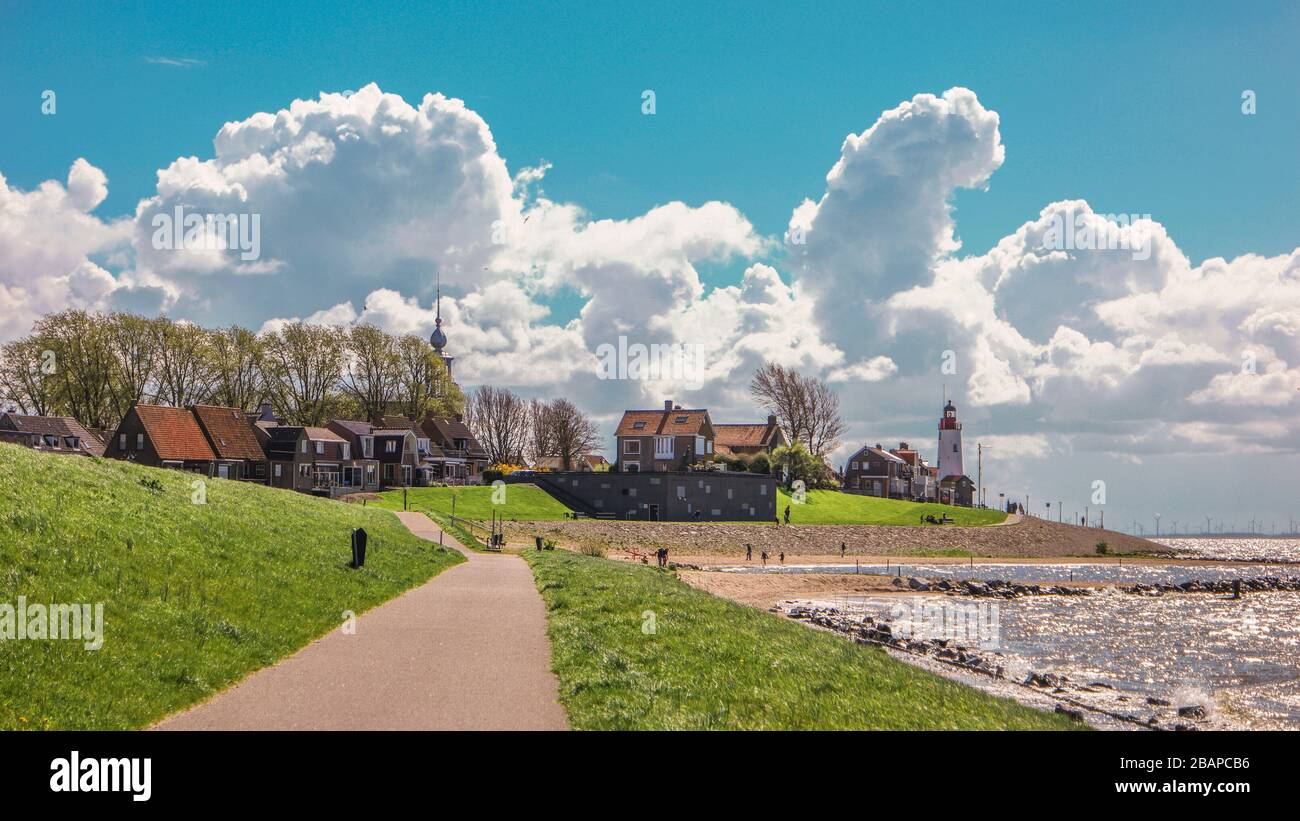 Urk Flevoland Netherlands, harbor with lighthouse on a bright summer in ...