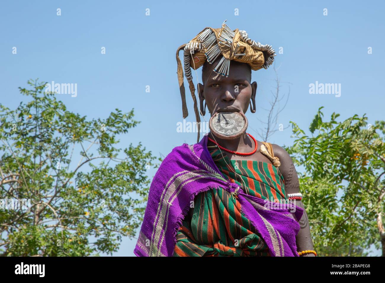 Woman of the Mursi tribe with clay lip disc as body Omo Zone, Ethiopia ...