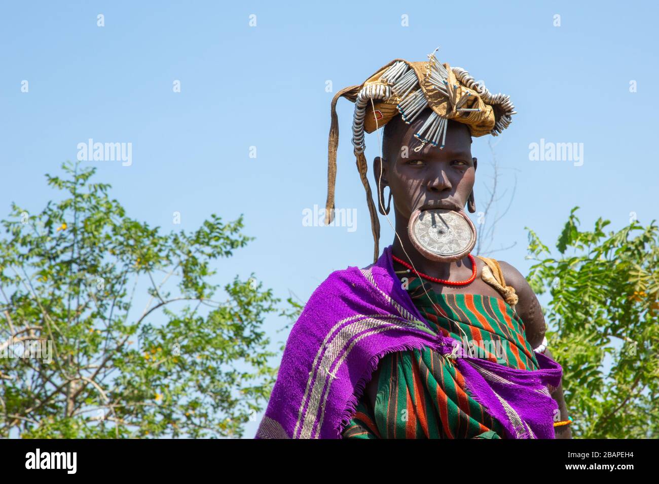 Woman of the Mursi tribe with clay lip disc as body Omo Zone, Ethiopia ...