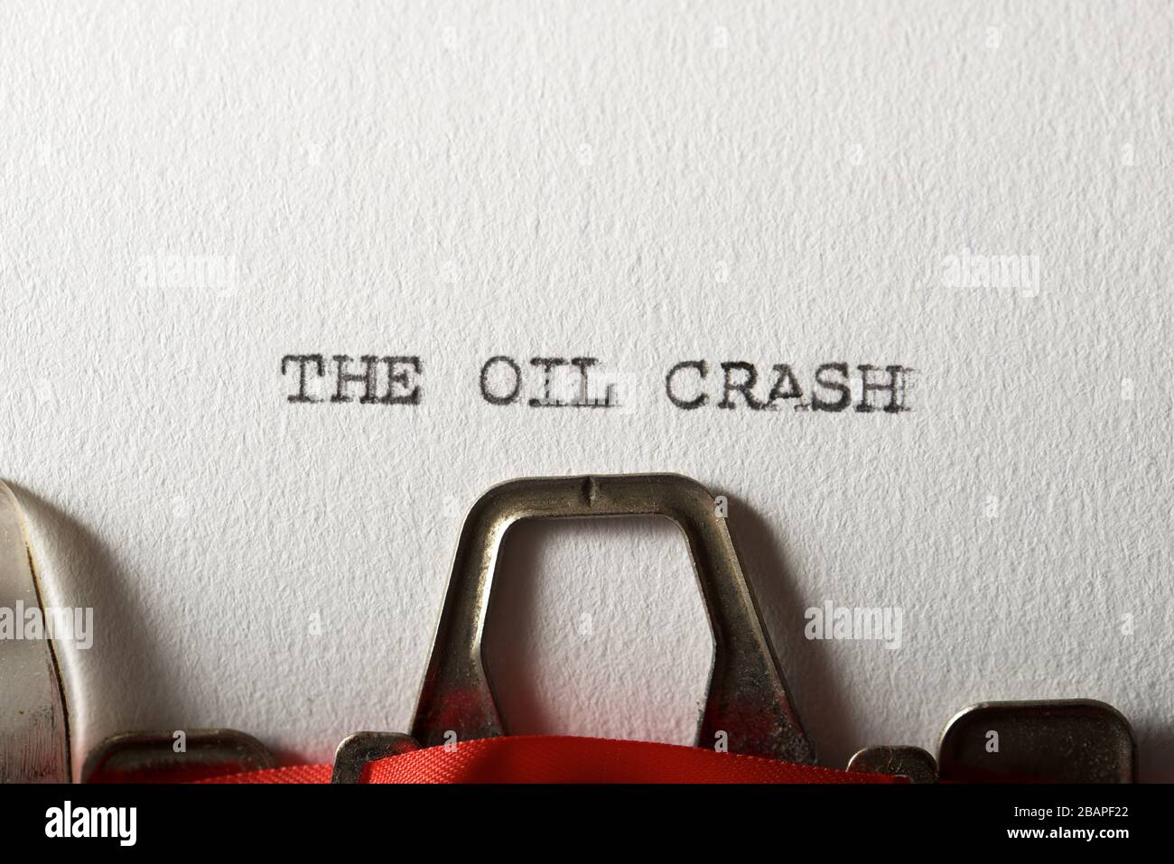 The sentence, The Oil Crash, written with a typewriter Stock Photo - Alamy
