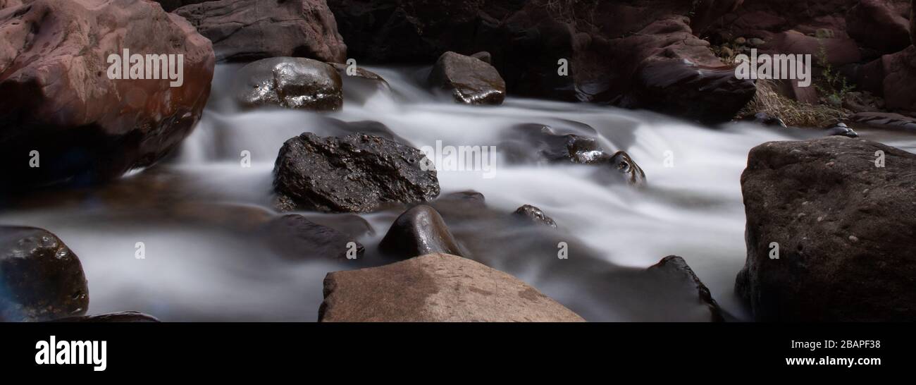 River flowing over rocks Stock Photo - Alamy