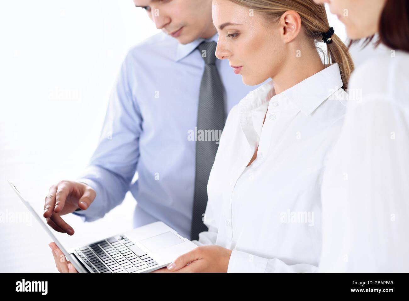 Group of business people using computer in office. Meeting and teamwork ...