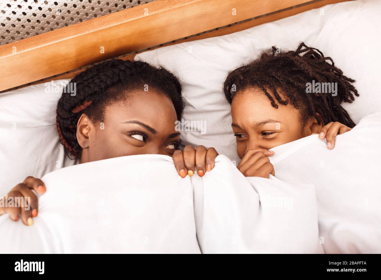Afro family having good time top view Stock Photo - Alamy