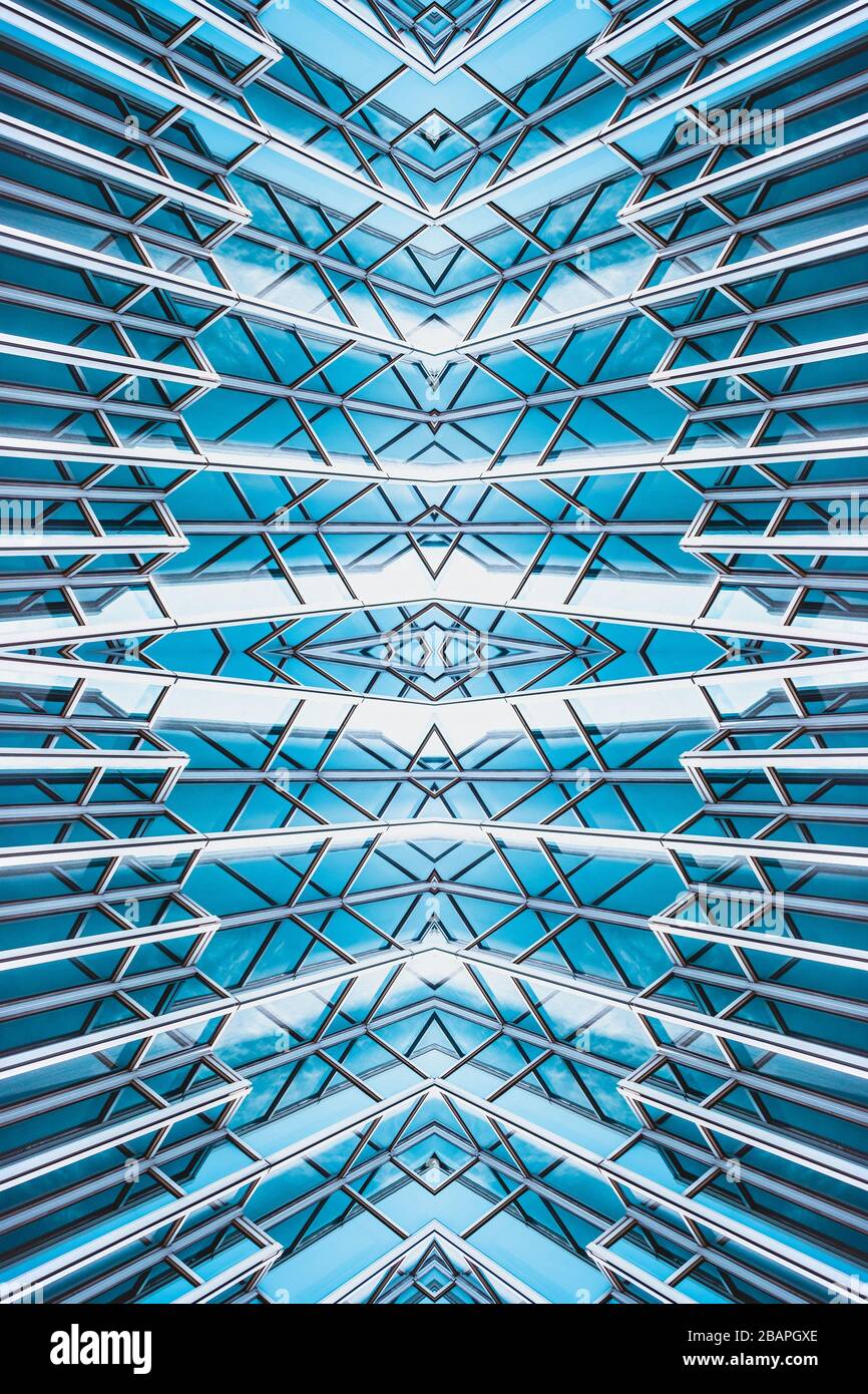 underside panoramic and perspective view to steel blue glass high rise ...