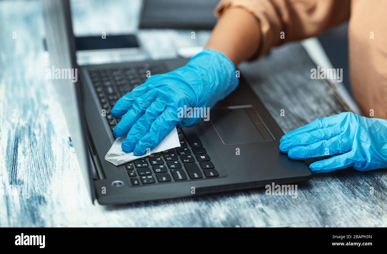 Disinfect wearing gloves hi-res stock photography and images - Alamy