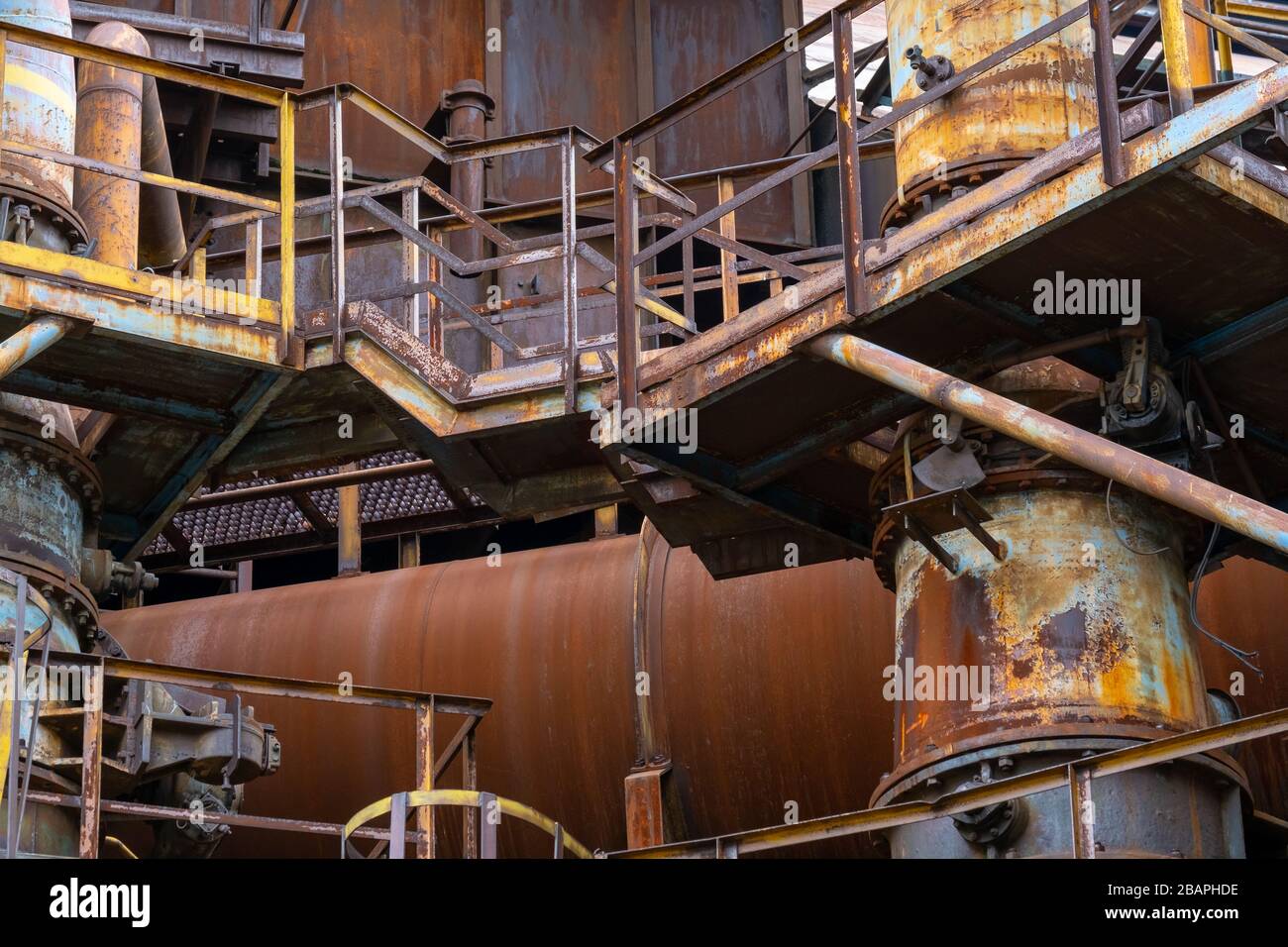 Old rusty construction of abandoned metallurgical plant Stock Photo - Alamy
