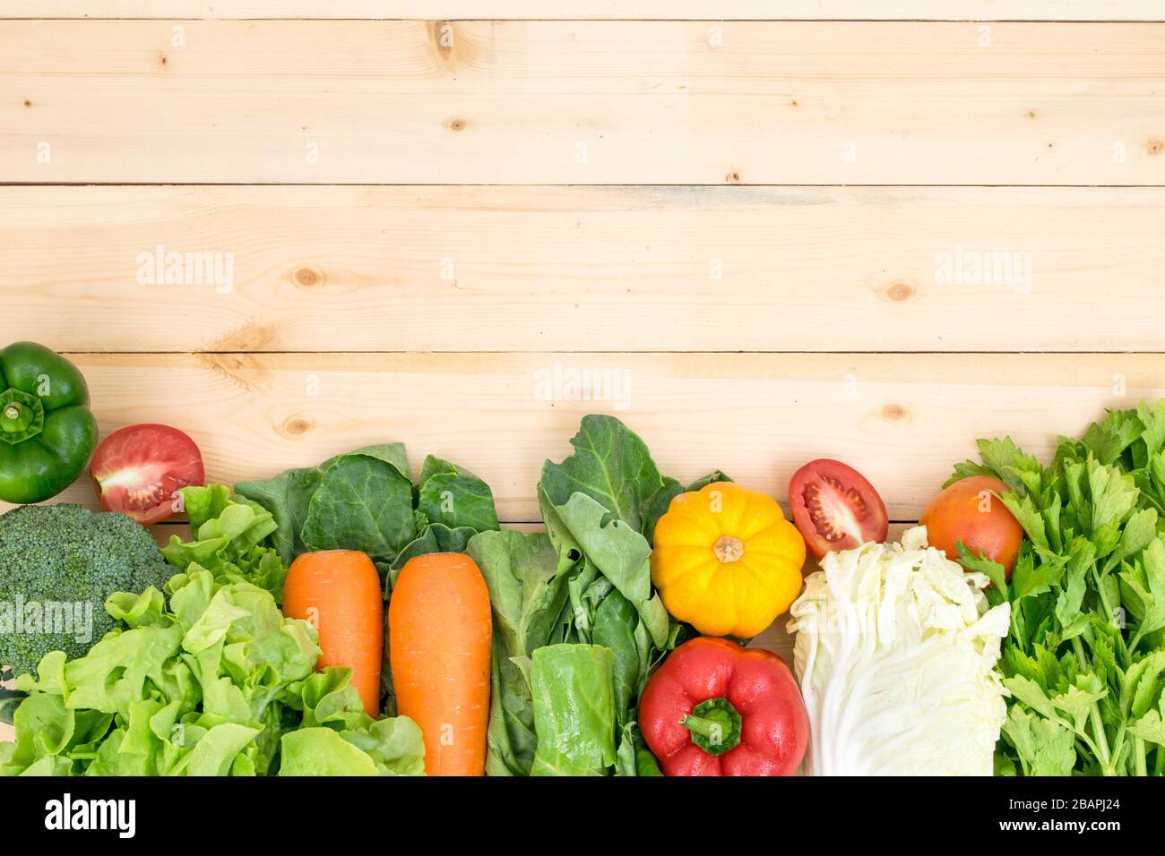 Vegetable healthy food on wooden table background Stock Photo - Alamy