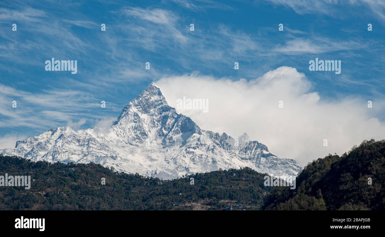 The famous Annapurna massif in the Humalayas covered in snow and ice in ...