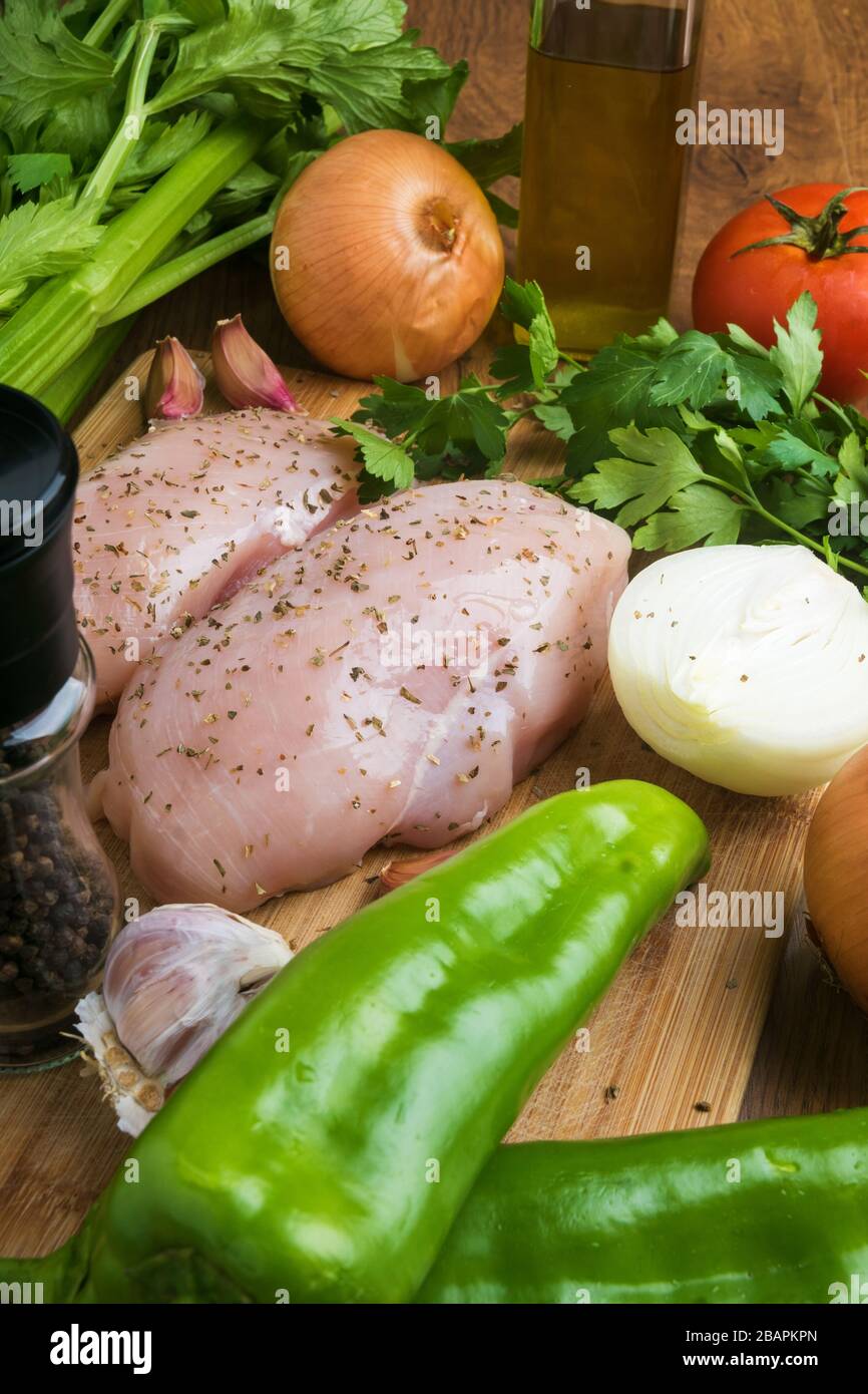 Chicken fresh meat with vegetables was photographed in the studio Stock ...